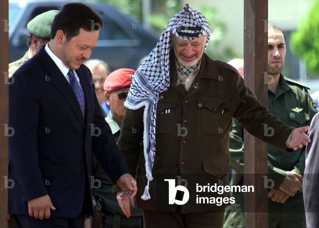 Image of PALESTINIAN PRESIDENT YASSER ARAFAT GESTURES TO JORDANIAN KING ABDULLAH AT