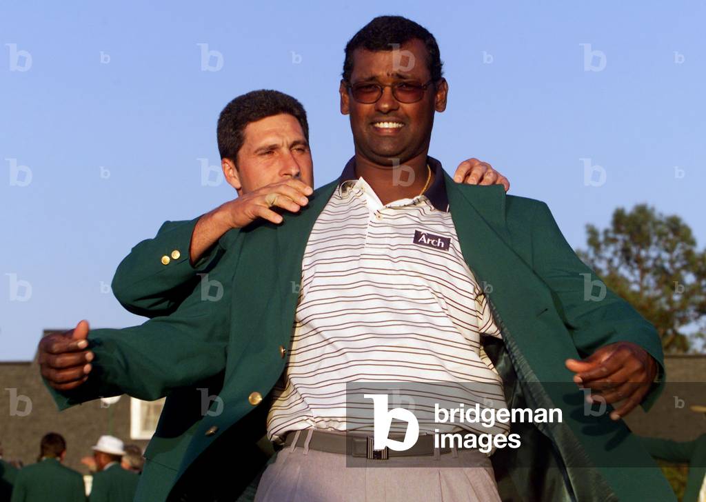 Image of 2000 Masters champion Vijay Singh of Fiji gets his green