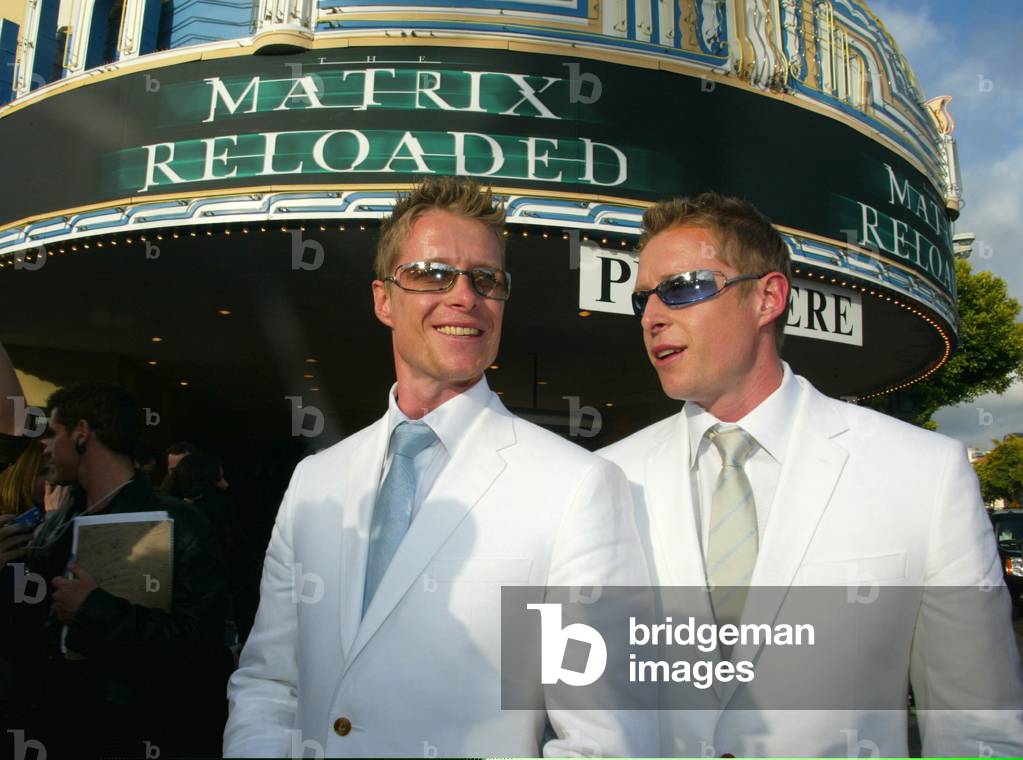 Image of Twin British actors Adrian (R) and Neil Rayment pose for