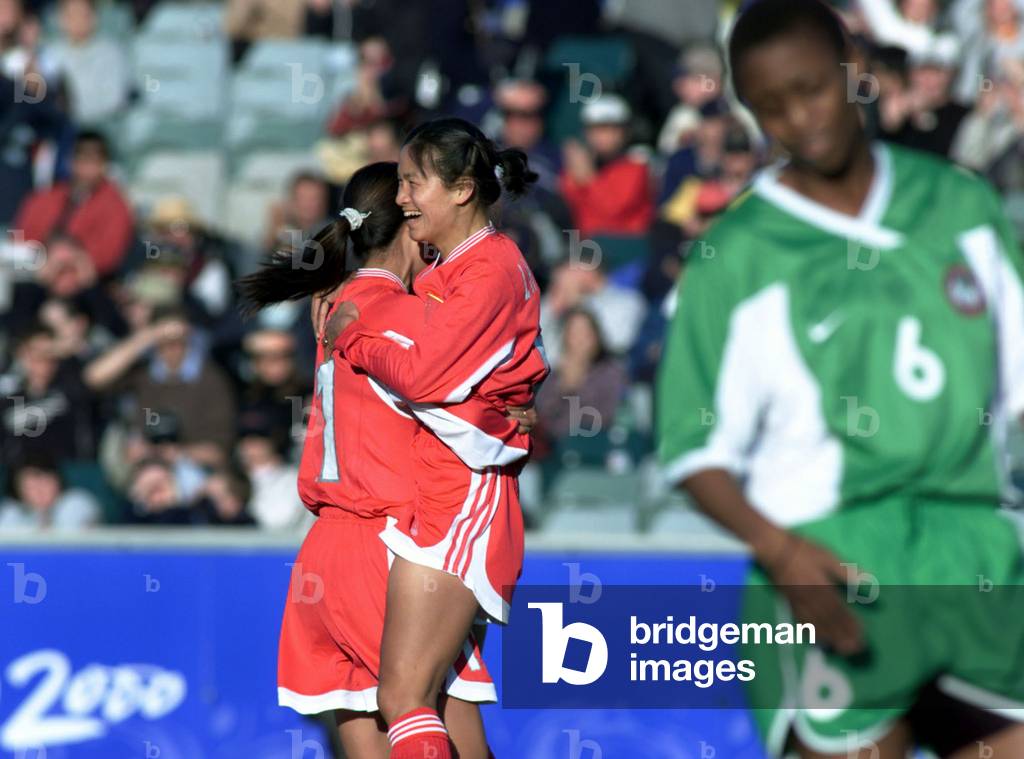 Image of CHINA'S ZHAO CELEBRATES SCORING AGAINST NIGERIA, 2000-09-14 ...