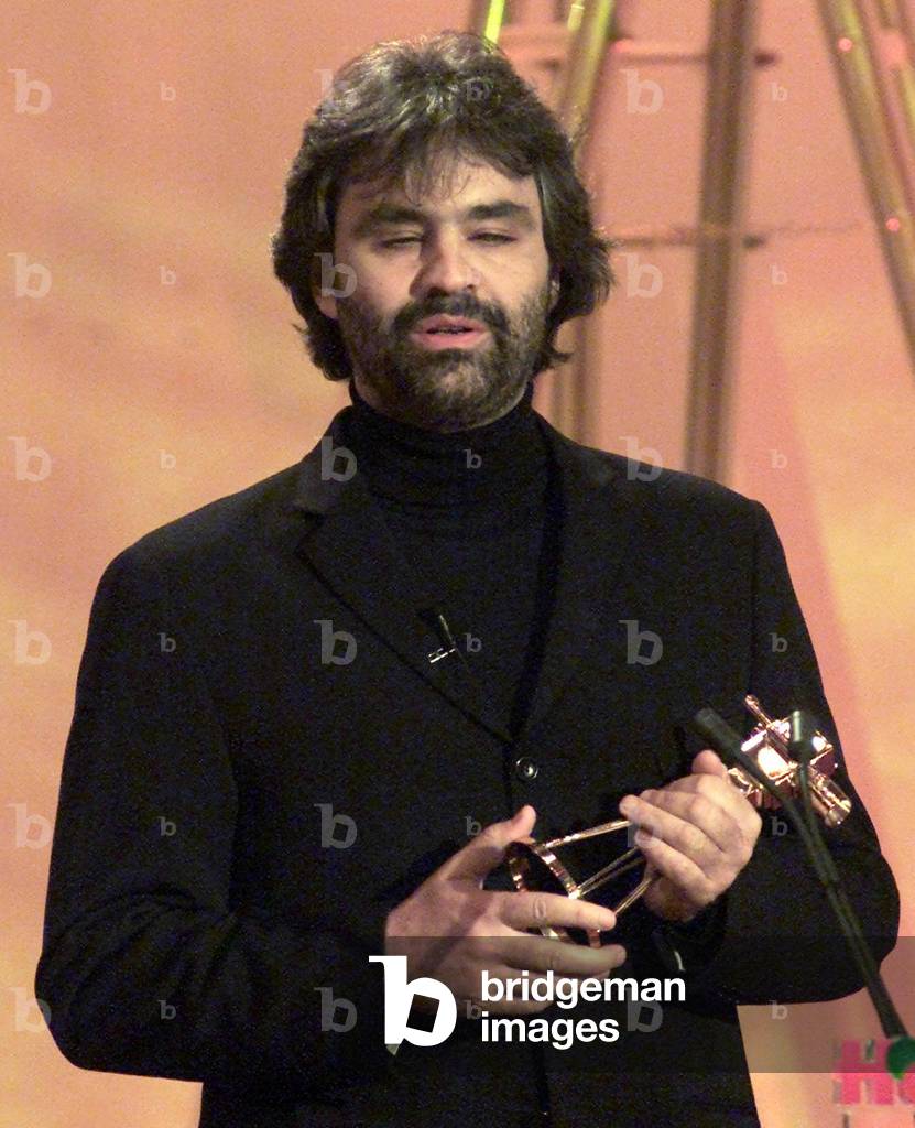 Image of ITALIAN SINGER ANDREA BOCELLI SMILES WITH AWARD DURING ...