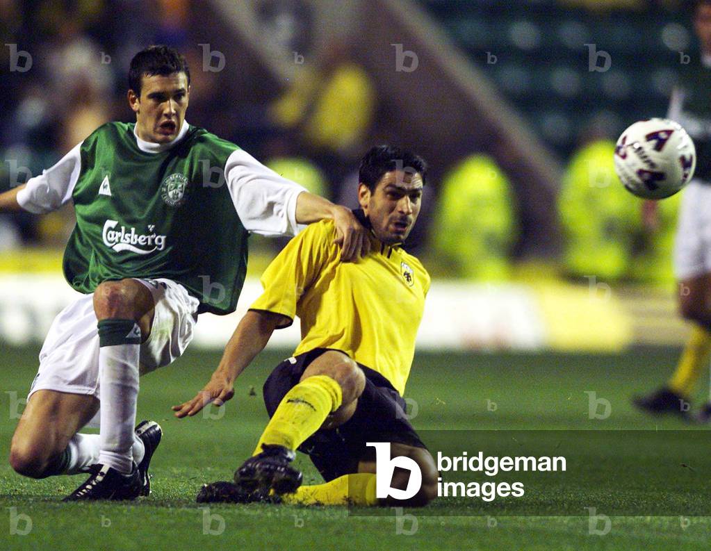 Image of HIBERNIAN FORWARD MATHIAS JACK BEATS AEK ATHENS ANDREAS ZIKOS TO