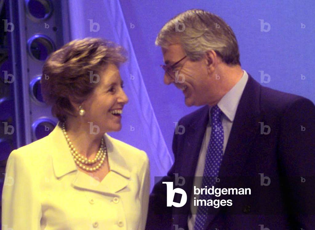 Image of PRIME MINISTER JOHN MAJOR SMILES AT HIS WIFE NORMA DURING