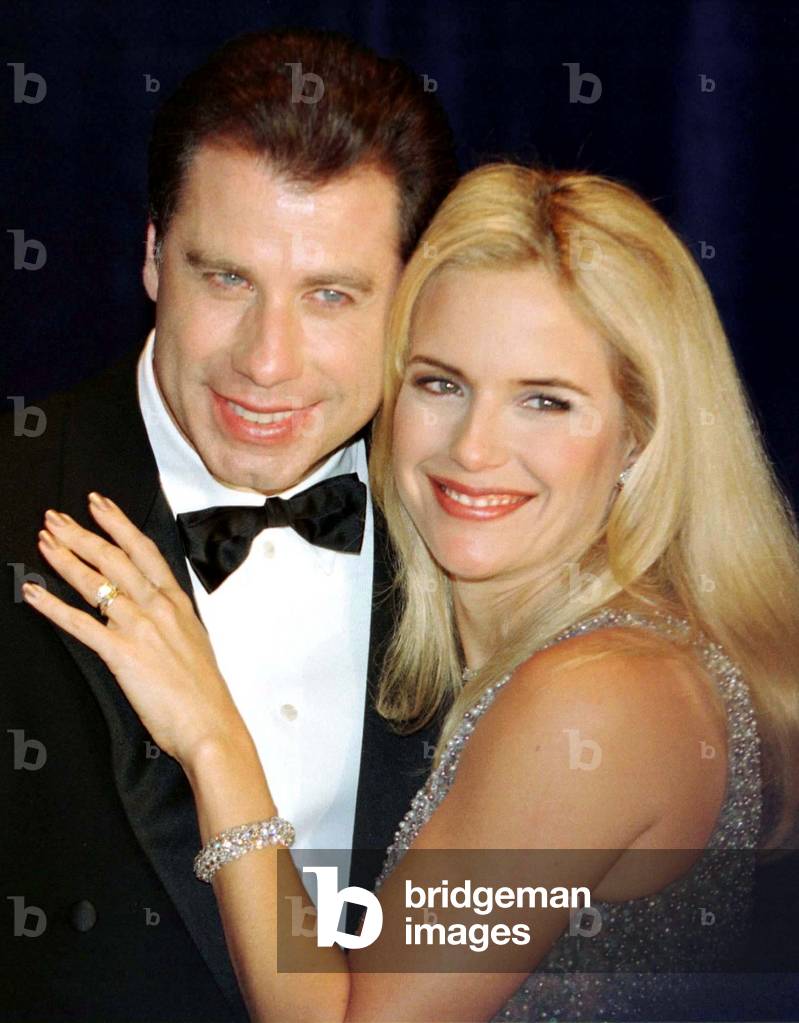 Image of Actor John Travolta and his wife Kelly Preston arrive for