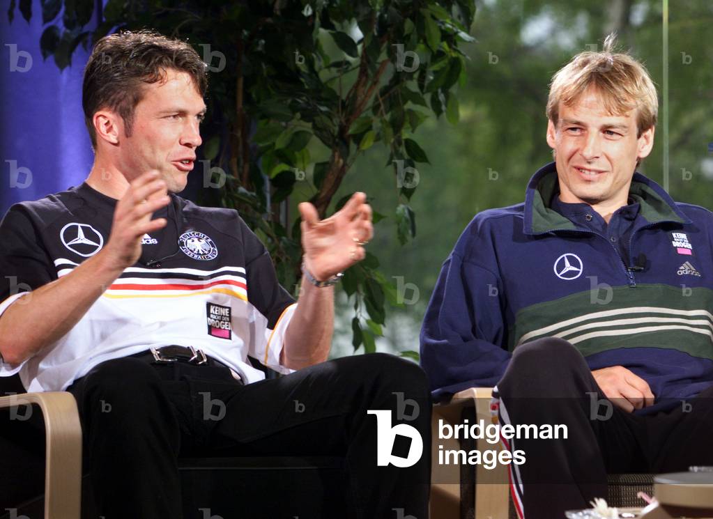 Image of GERMAN SOCCER PLAYER MATTHAEUS AND KILNSMANN DURING A LIVE TV