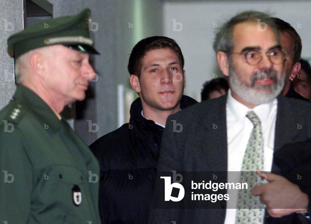 Image of TURKISH TEENAGER MUHLIS ARI ENTERS A COURTROOM IN MUNICH, 2000 ...
