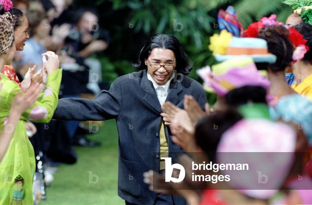 Image of French/Japanese designer Kenzo is aplauded by his models at the