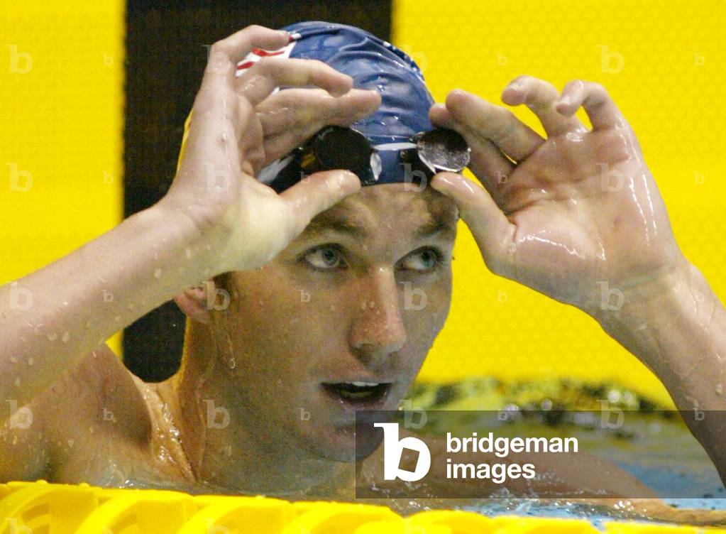 Image of U.S. SWIMMER PEIRSOL CHECKS TIME AFTER WINNING MEN'S 200 METRE ...