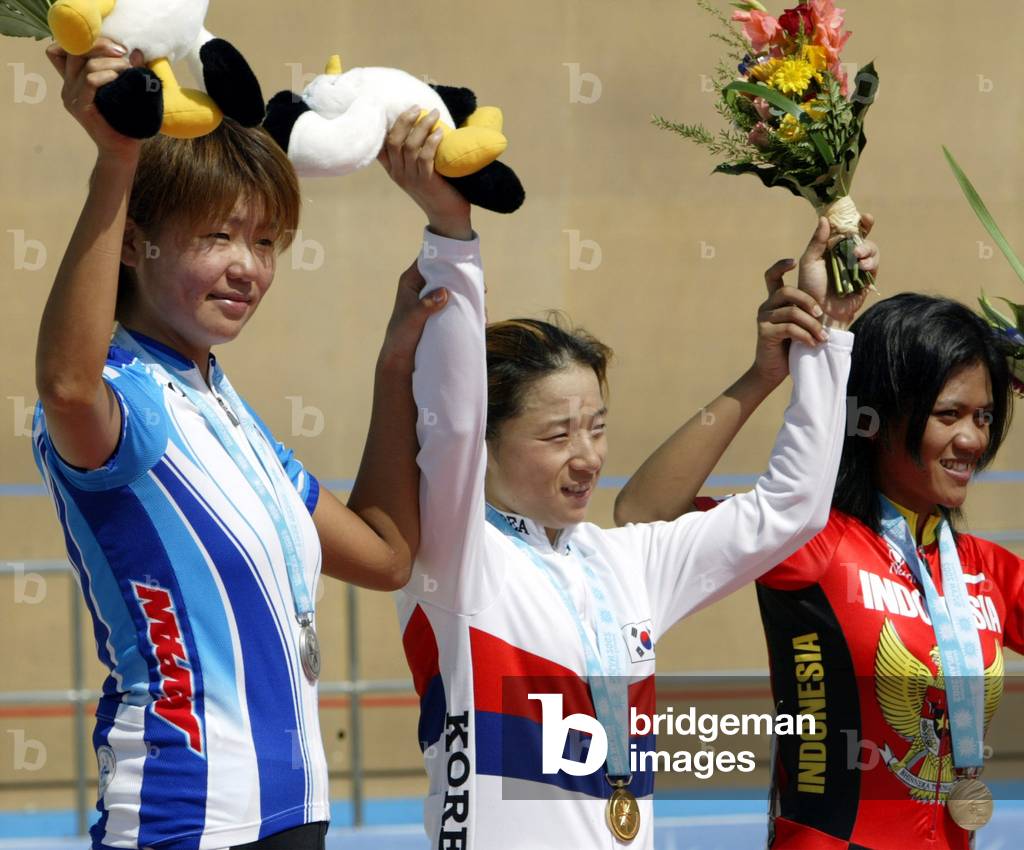 Image of SOUTH KOREA'S KIM POSES AFTER SHE WON GOLD IN THE