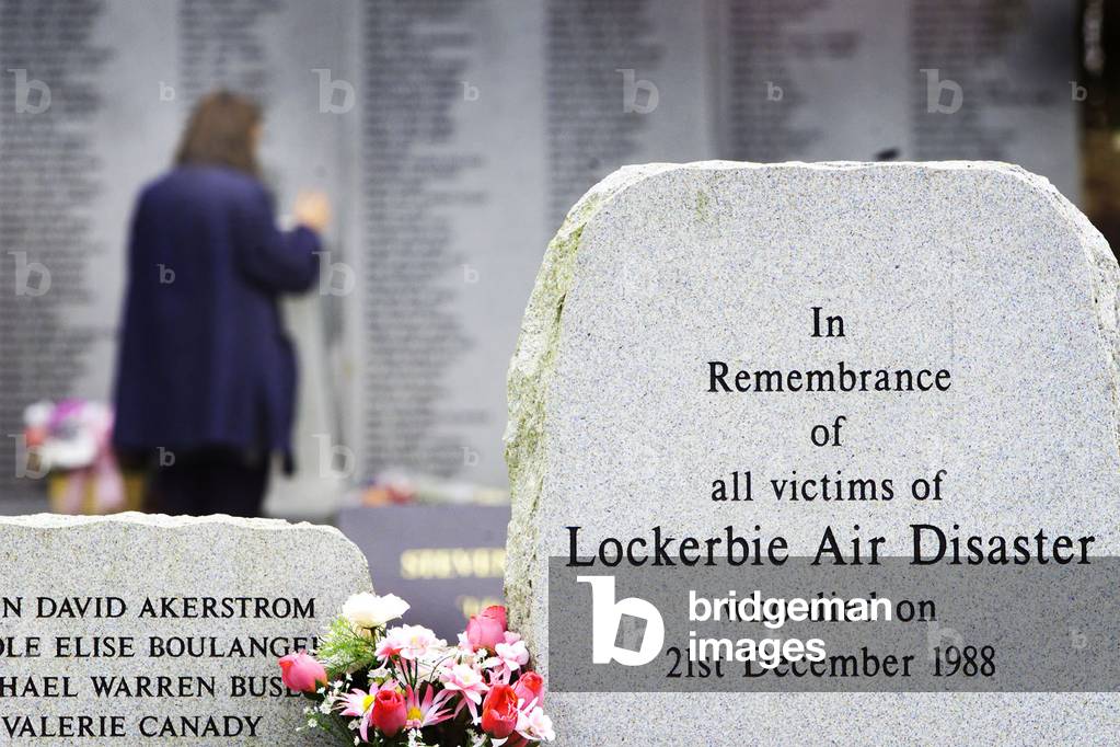 Image of A WOMAN VISITS THE MEMORIAL GARDEN AT LOCKERBIE, 2000-05-03 ...