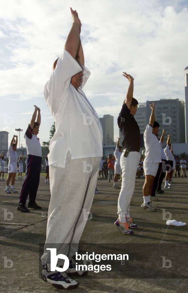 Image of PHILIPPINE NATIONAL POLICE OFFICERS DO MORNING EXERCISES ...