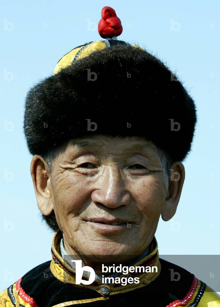 Image of MONGOLIAN WEARS TRADITIONAL HEADGEAR DURING NAADAM FESTIVAL IN ...