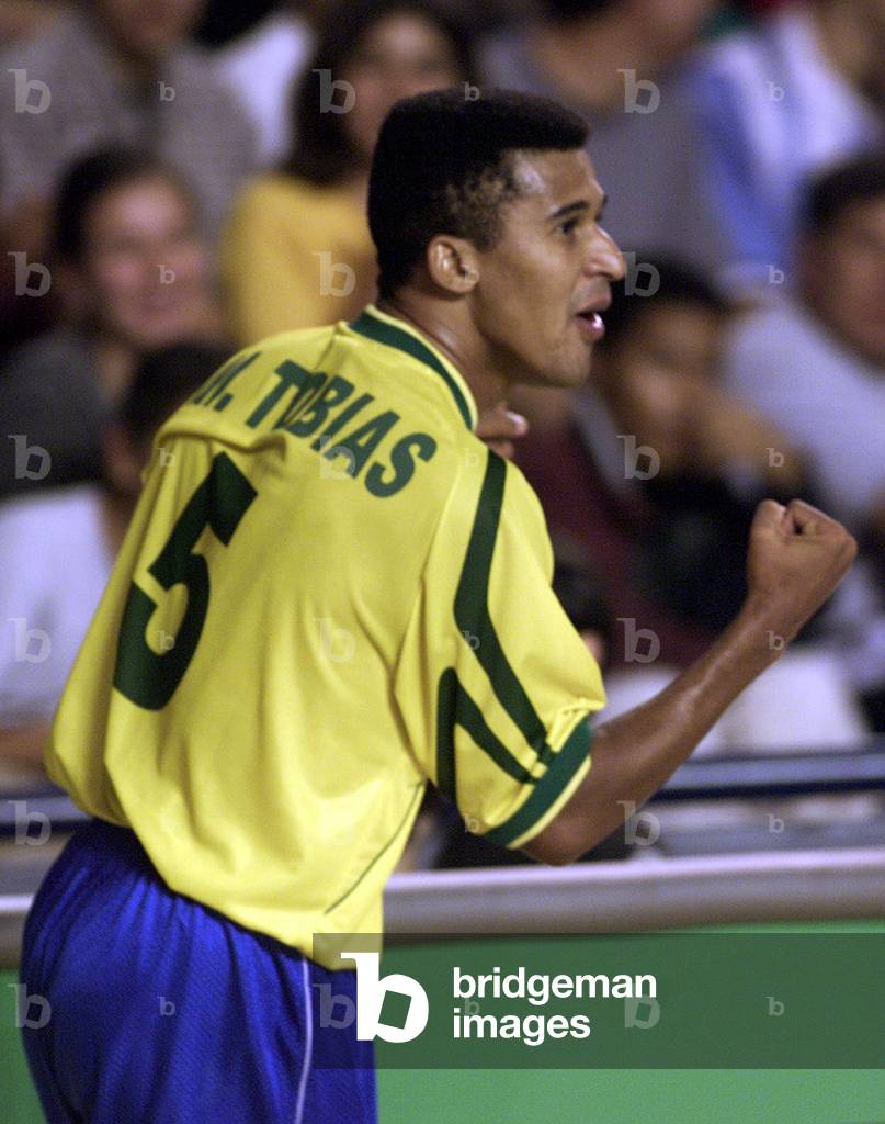Image of BRAZILIAN INDOOR SOCCER PLAYER TOBIAS CELEBRATES AFTER SCORING ...
