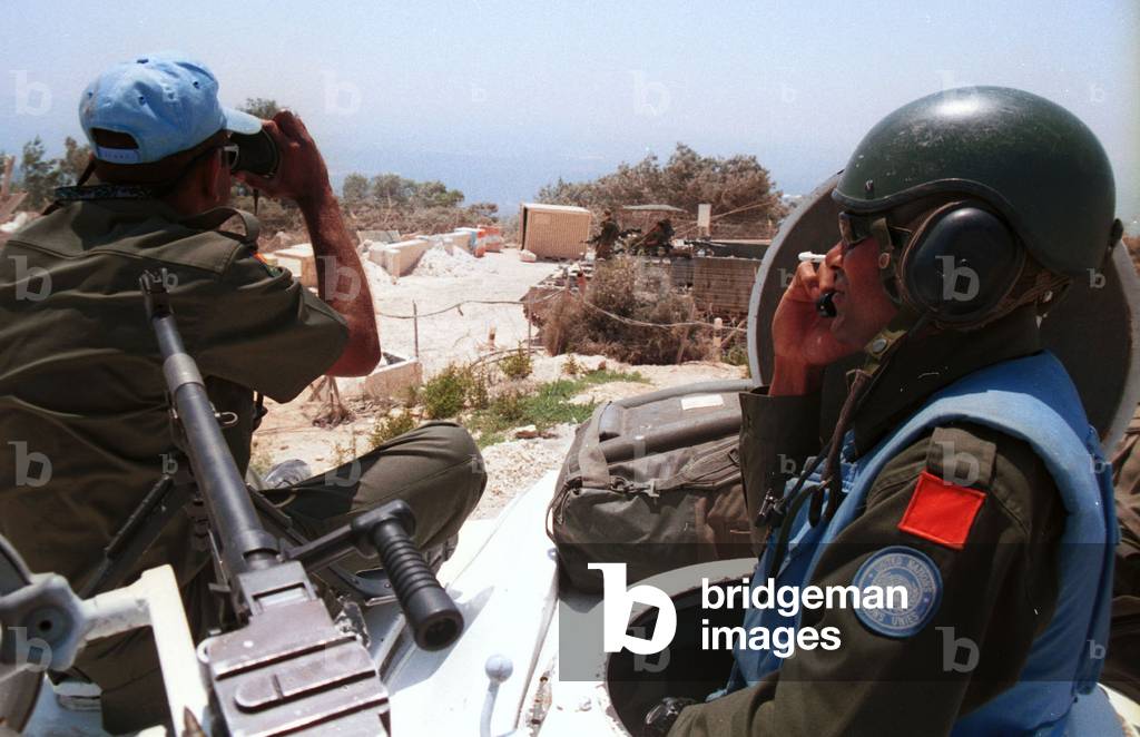 Image of UNITED NATIONS PEACEKEEPER OF NEPAL SOLDIERS WATCH AN ISRAELI ...