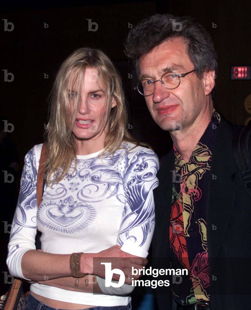 Image of Dutch film director Wim Wenders (R) poses with actress Daryl
