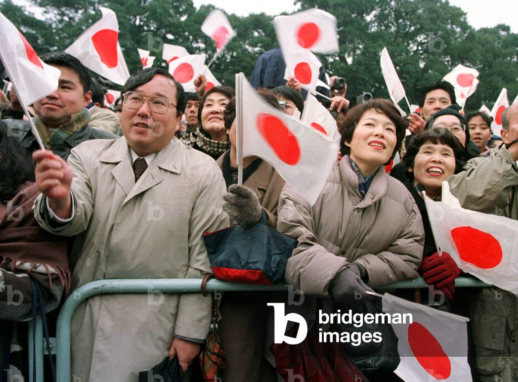 Image of Well-wishers wave Japanese flags and shout "banzai" cheers to the
