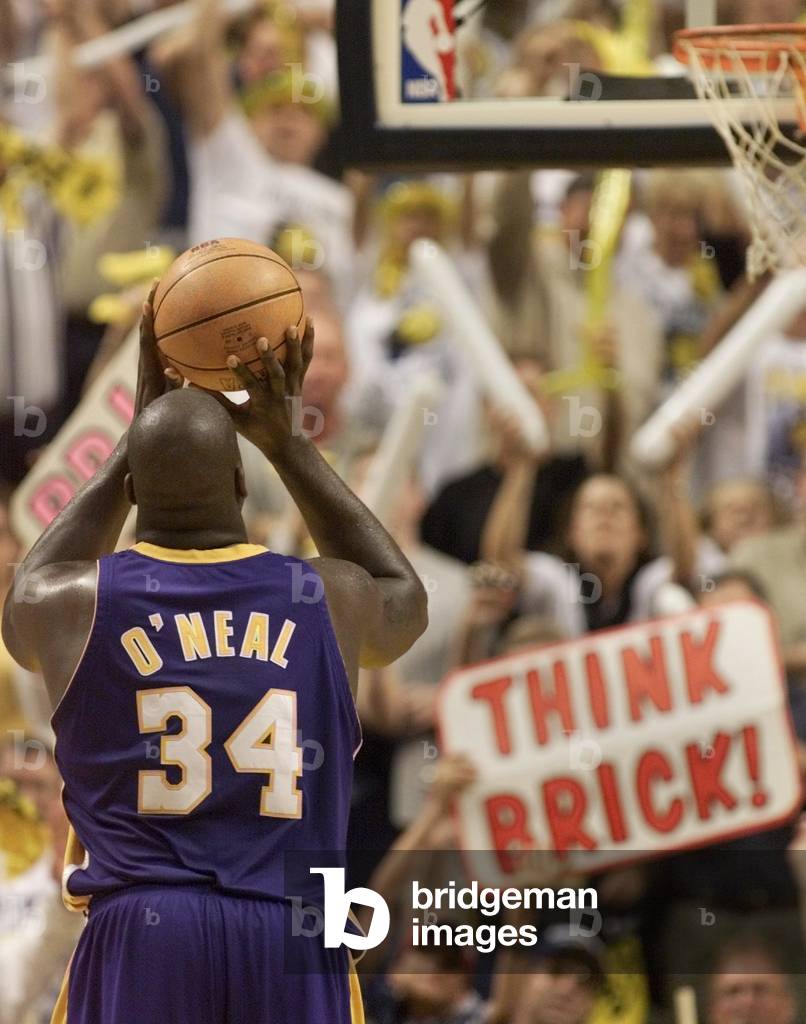 Image of SHAQUILLE O'NEAL ON THE FREE THROW LINE IN FOURTH QUARTER,