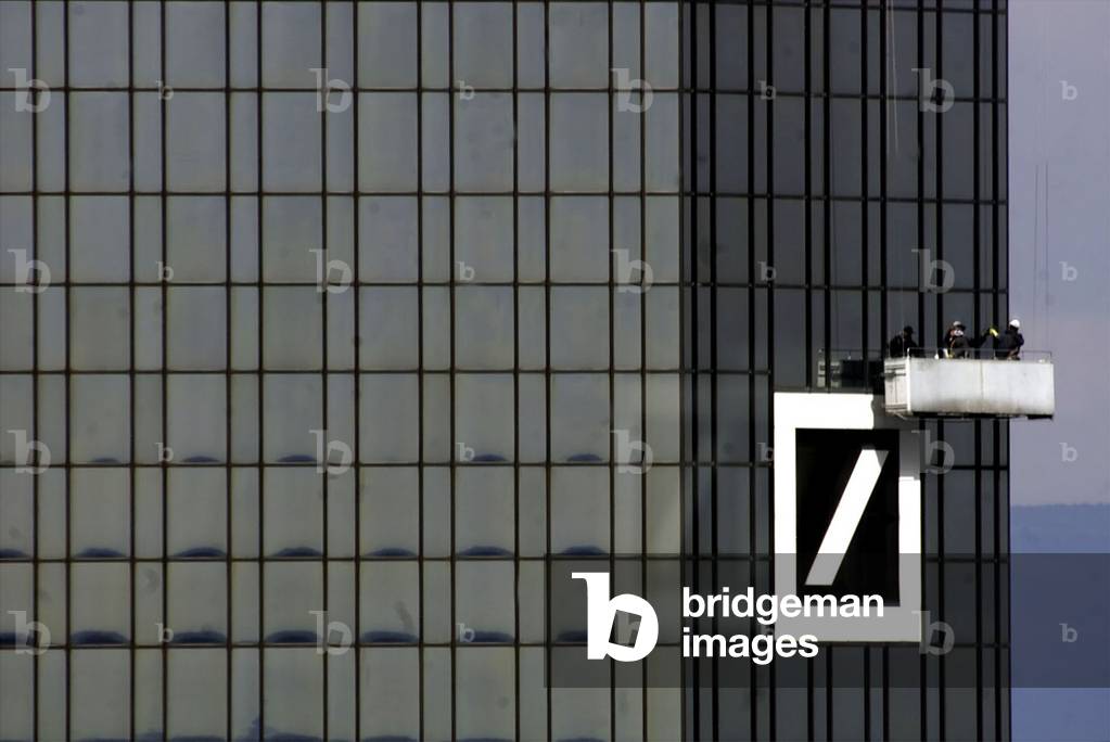 Image of WINDOW CLEANERS DO THEIR WORK AT DEUTSCHE BANK TWIN TOWERS
