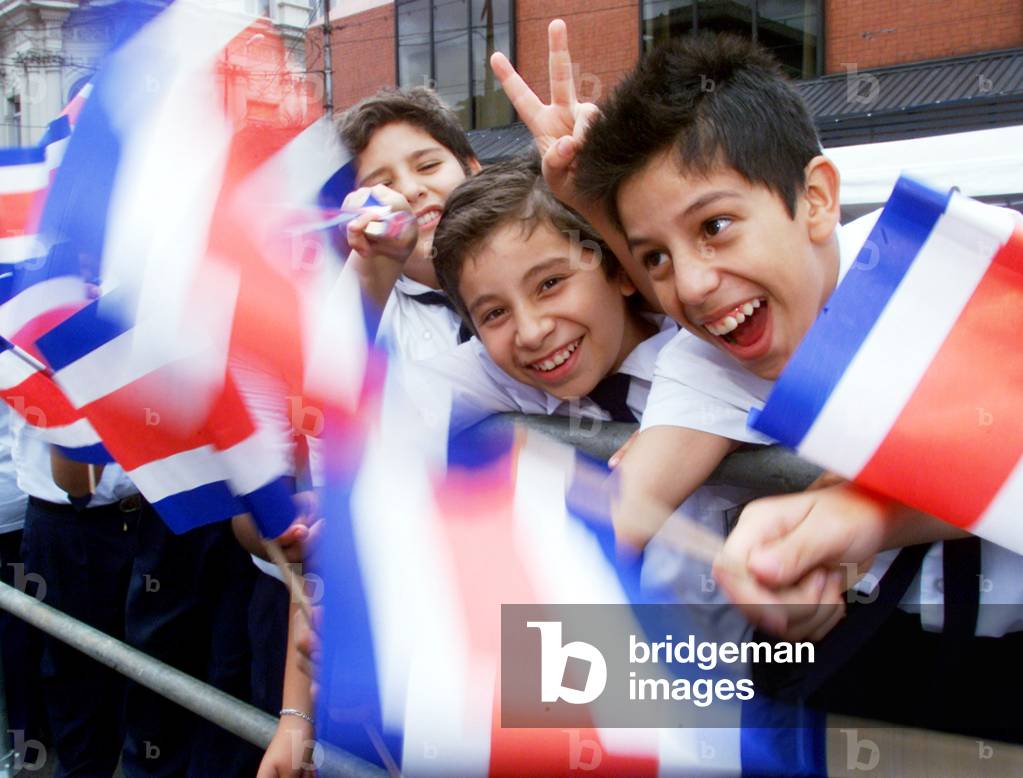 Image of COSTA RICAN SCHOOL CHILDREN WAVE NATIONAL FLAGS DURING ...