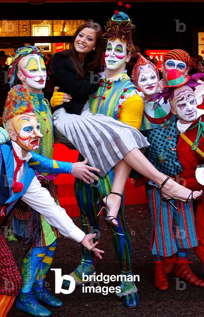 Image of AUSTRALIAN SINGER HOLLY VALANCE IS LIFTED BY MEMBERS OF THE