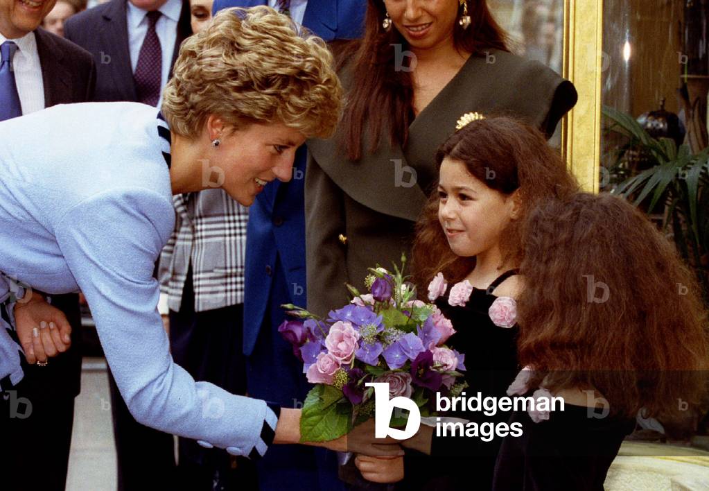 Image of The Princess of Wales receives a bouquet from 7 year-old