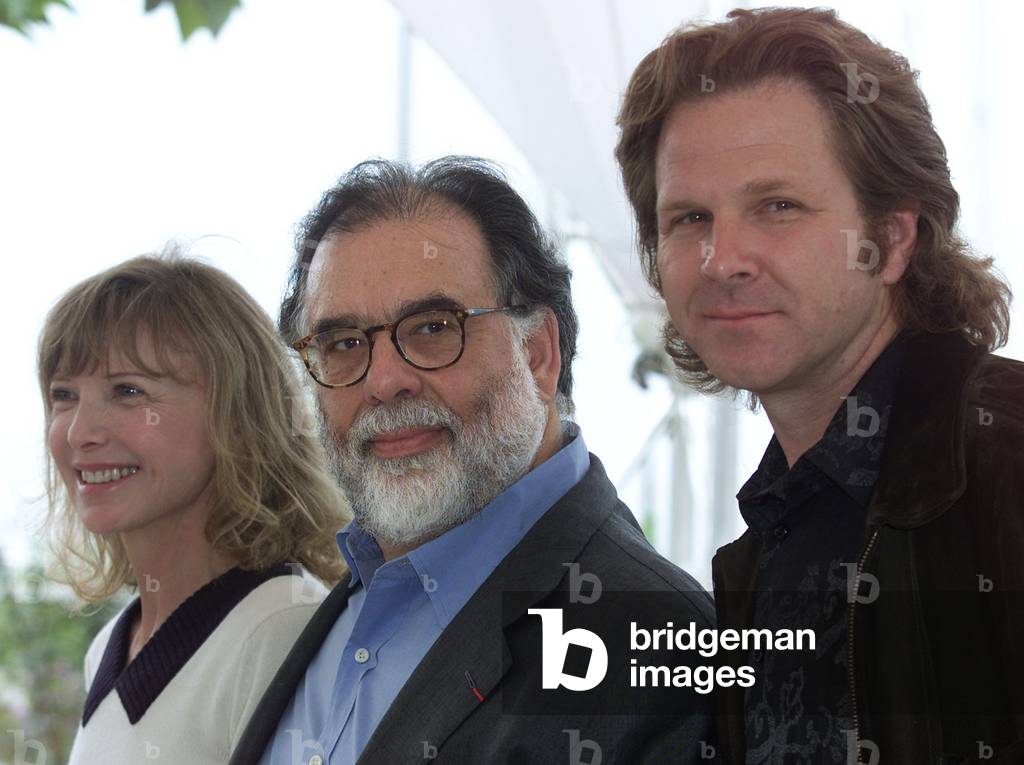 Image of US DIRECTOR FRANCIS FORD COPPOLA POSES WITH ACTORS SAM BOTTOMS