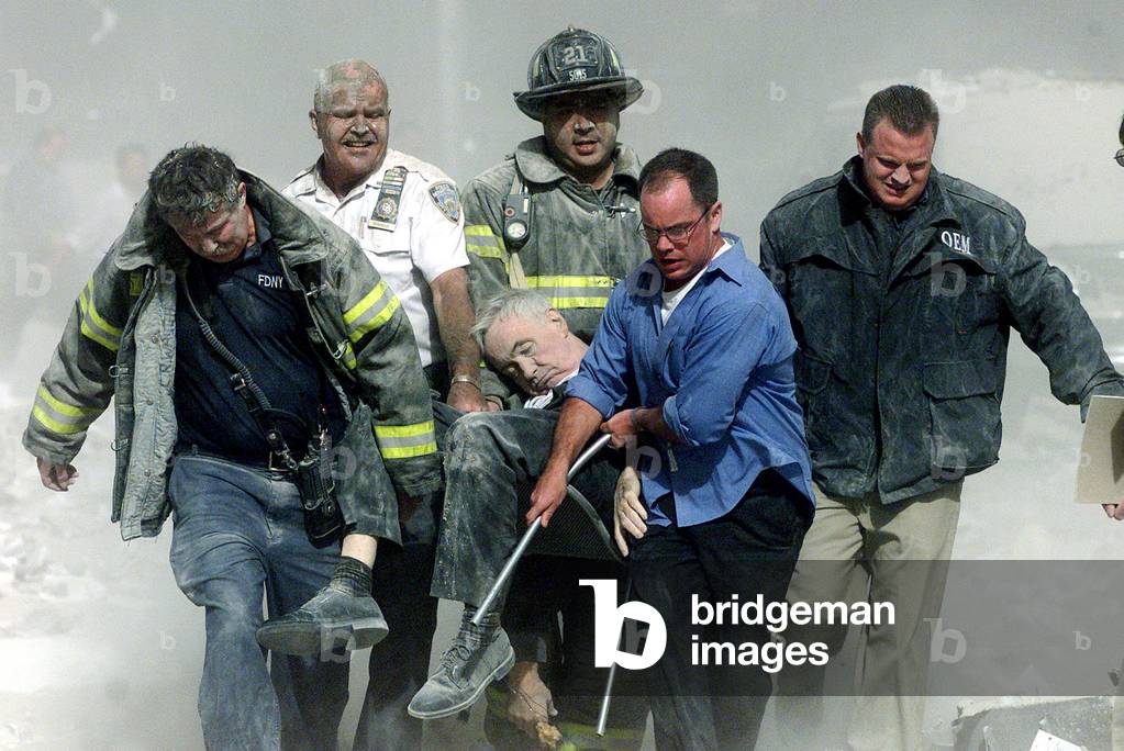 Image of Rescue worker remove a man from one of the World