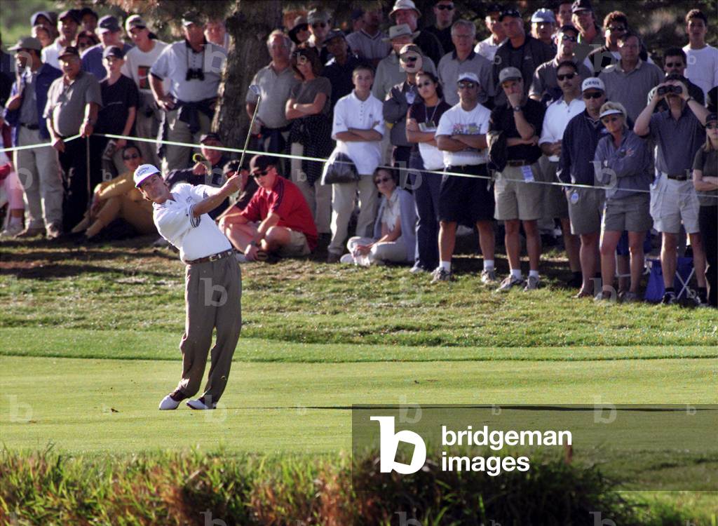 Image of PAUL AZINGER FOLLOWS THROUGH ON APPROACH AT BELL CANADIAN OPEN,