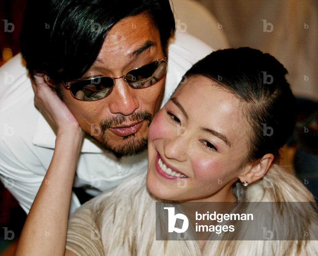 Image of HONG KONG ACTOR LEUNG AND ACTRESS CHEUNG POSE IN HONG