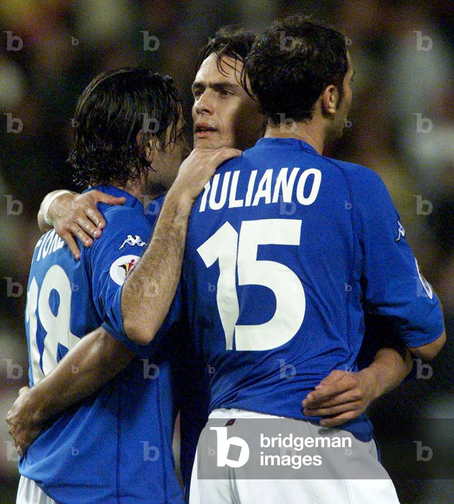 Image of ITALY'S GOAL SCORER FILIPPO INZAGHI HUGS TEAM MATES MARK IULIANO