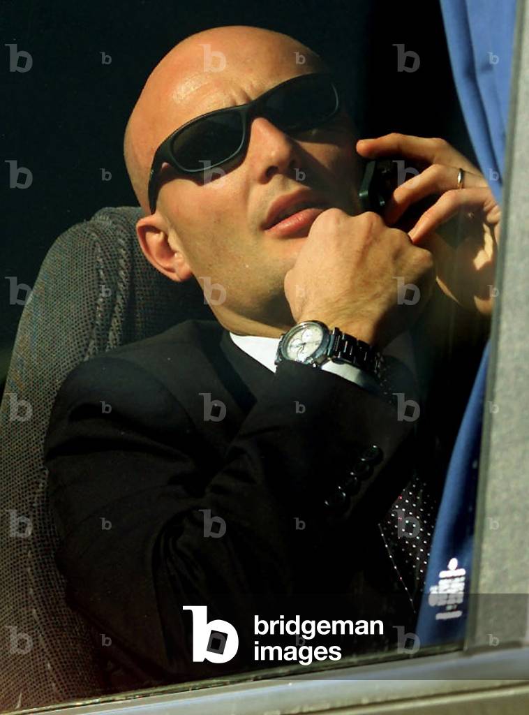 Image of CHELSEA'S LEBOEUF SPEAKS ON HIS MOBILE PHONE AS THE TEAM