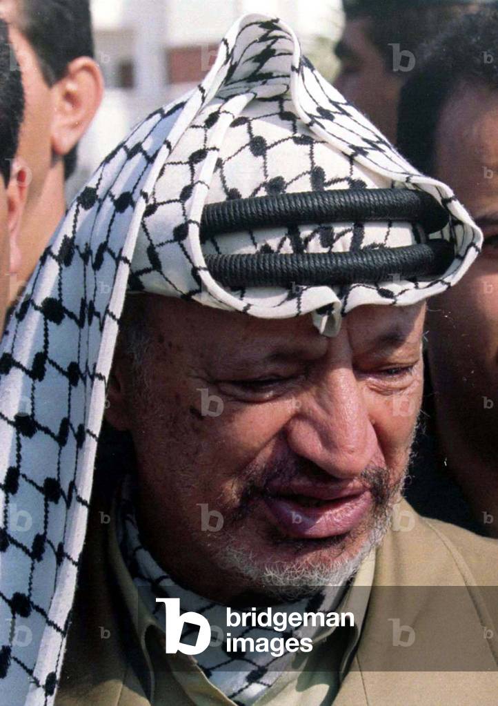 Image of PALESTINIAN PRESIDENT YASSER ARAFAT SPEAKS TO PRESS IN GAZA,