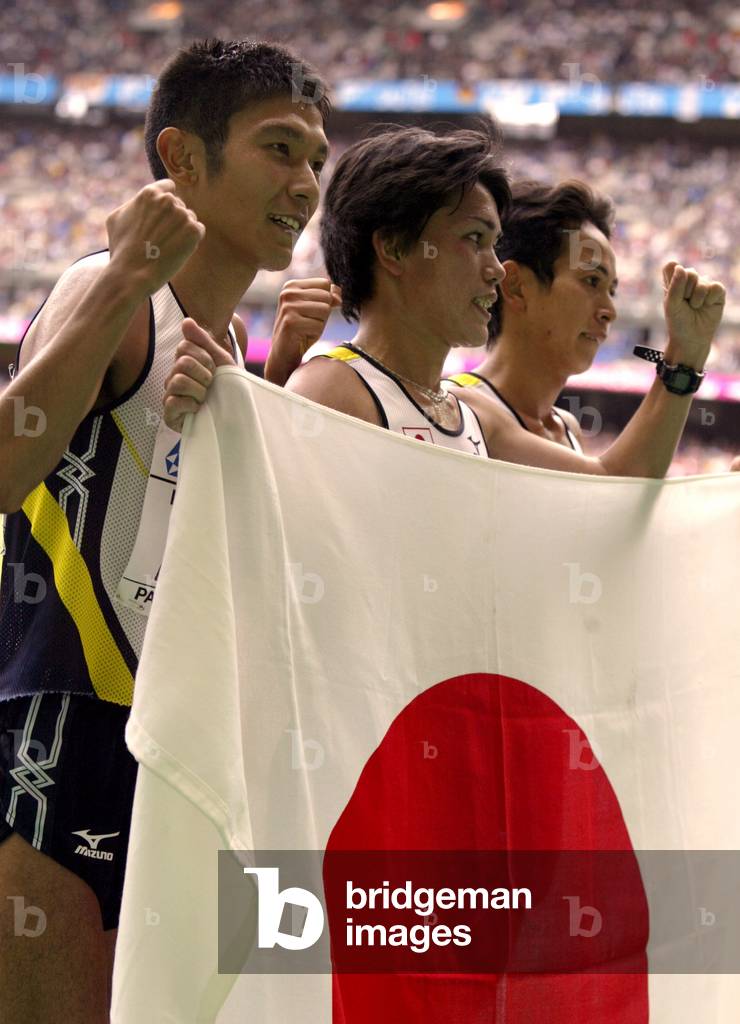 Image of JAPAN'S ATSUSHI SATO, SHIGERU ABURAYA AND TSUYOSHI OGATA POSE AFTER