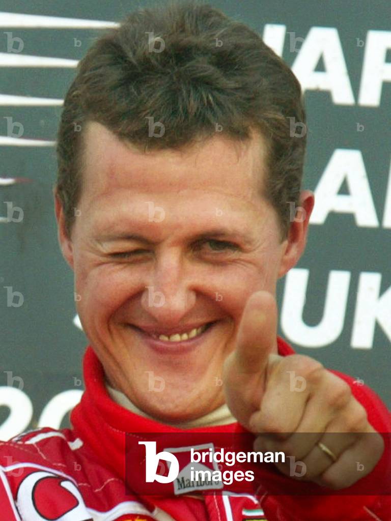 Image of GERMAN MICHAEL SCHUMACHER GIVES THUMBS-UP SIGN AFTER WINNING ...