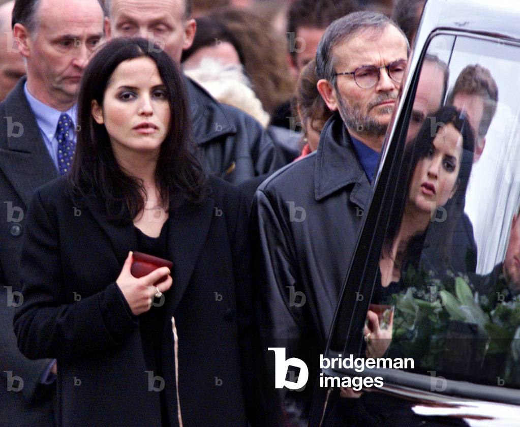 Image of ANDREA CORR AND HER FATHER WALK BEHIND JEAN CORR'S COFFIN