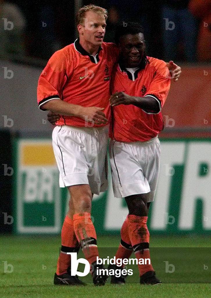 Image of DUTCH PLAYERS CELEBRATE THEIR FIRST GOAL AGAINST BRAZIL DURING ...