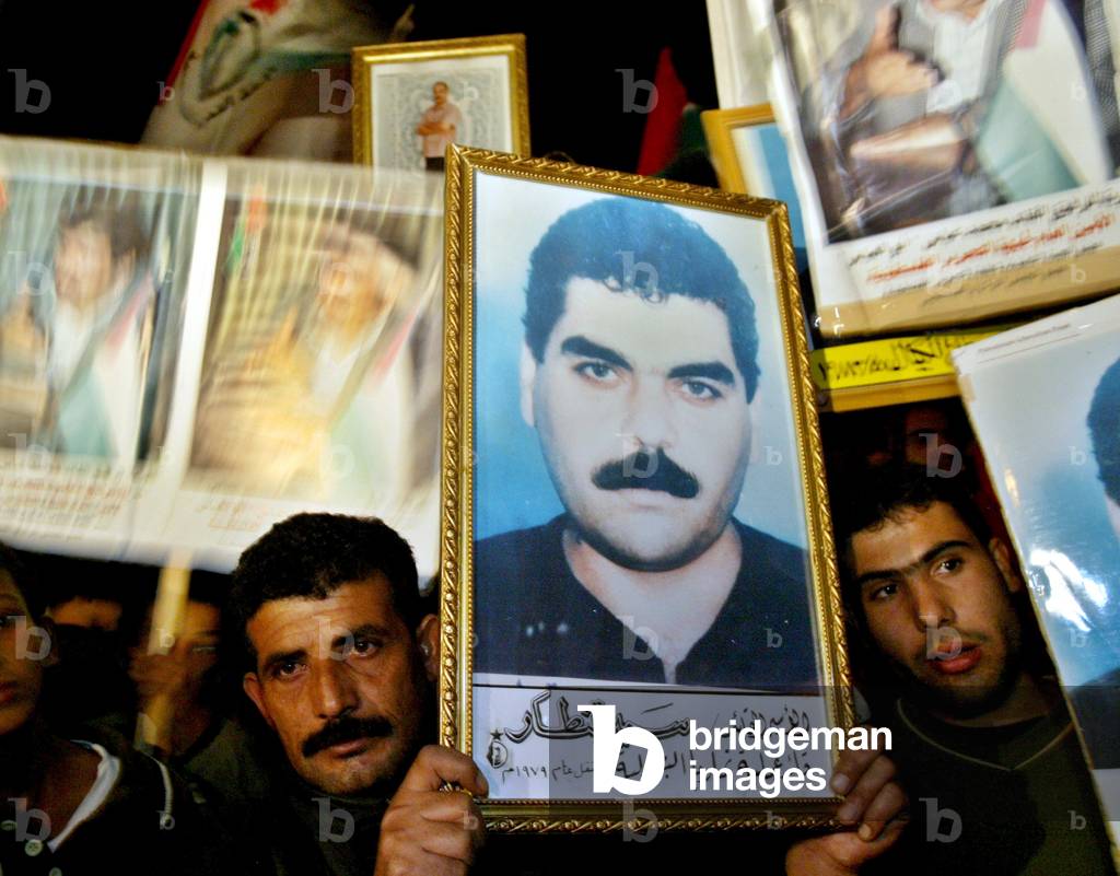 Image of PALESTINIAN MEN HOLD UP PICTURES OF LEBANESE SAMIR QANTAR ...