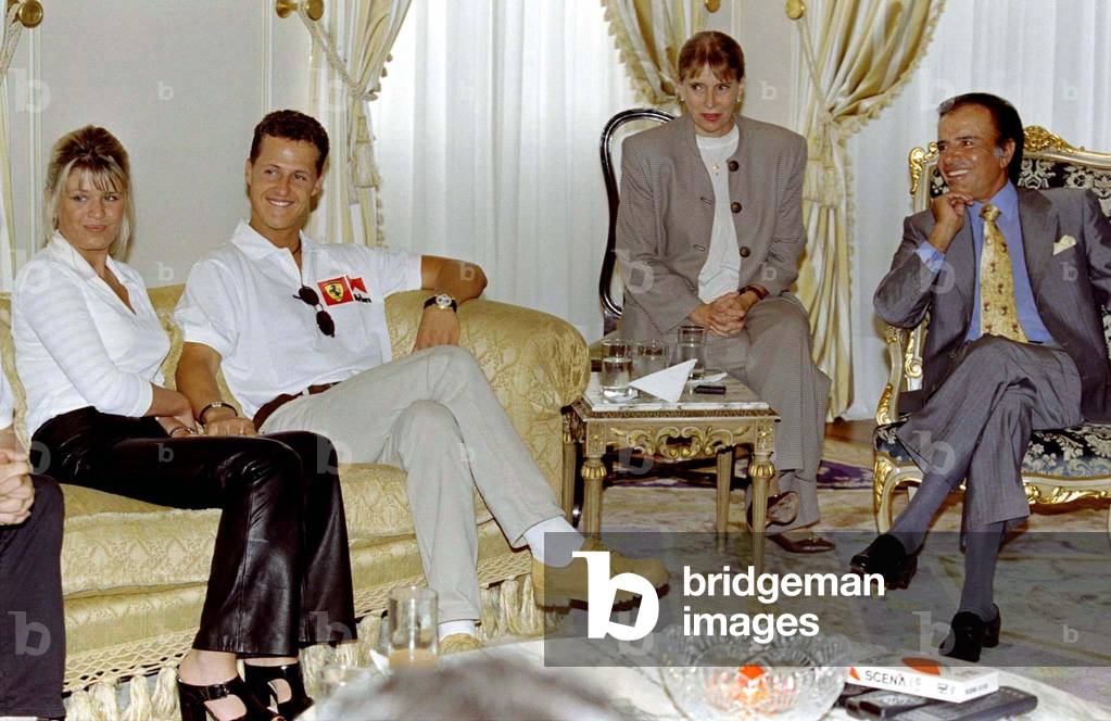 Image of Argentine President Carlos Menem (R) meets Ferrari's German ...