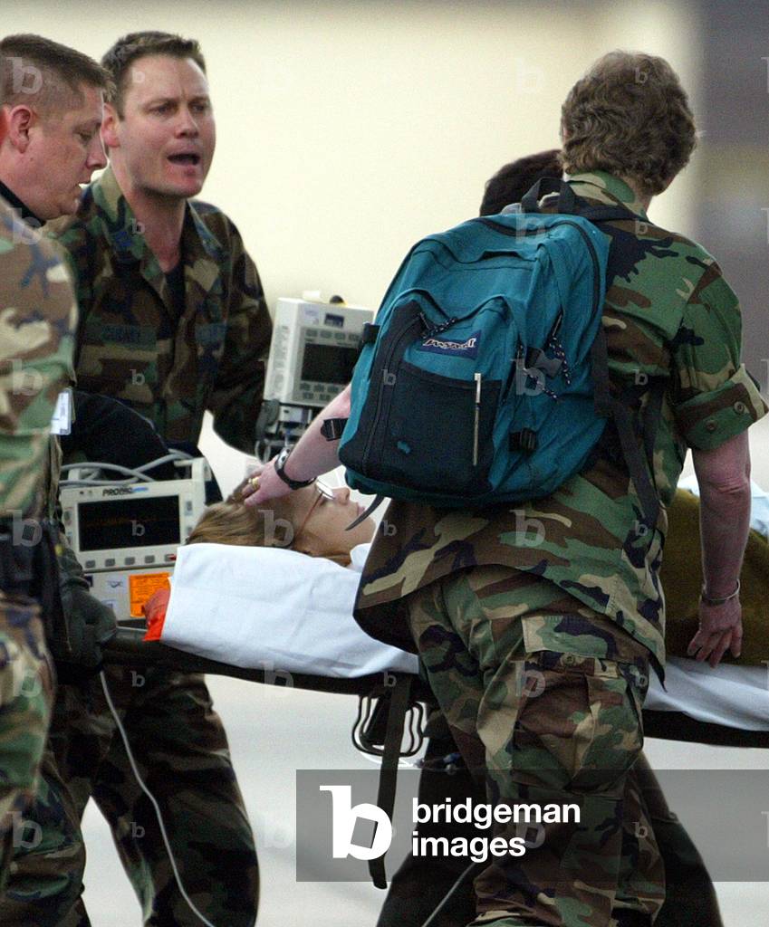 Image of EX-POW ARMY PRIVATE FIRST CLASS JESSICA LYNCH IS STRETCHERED TO