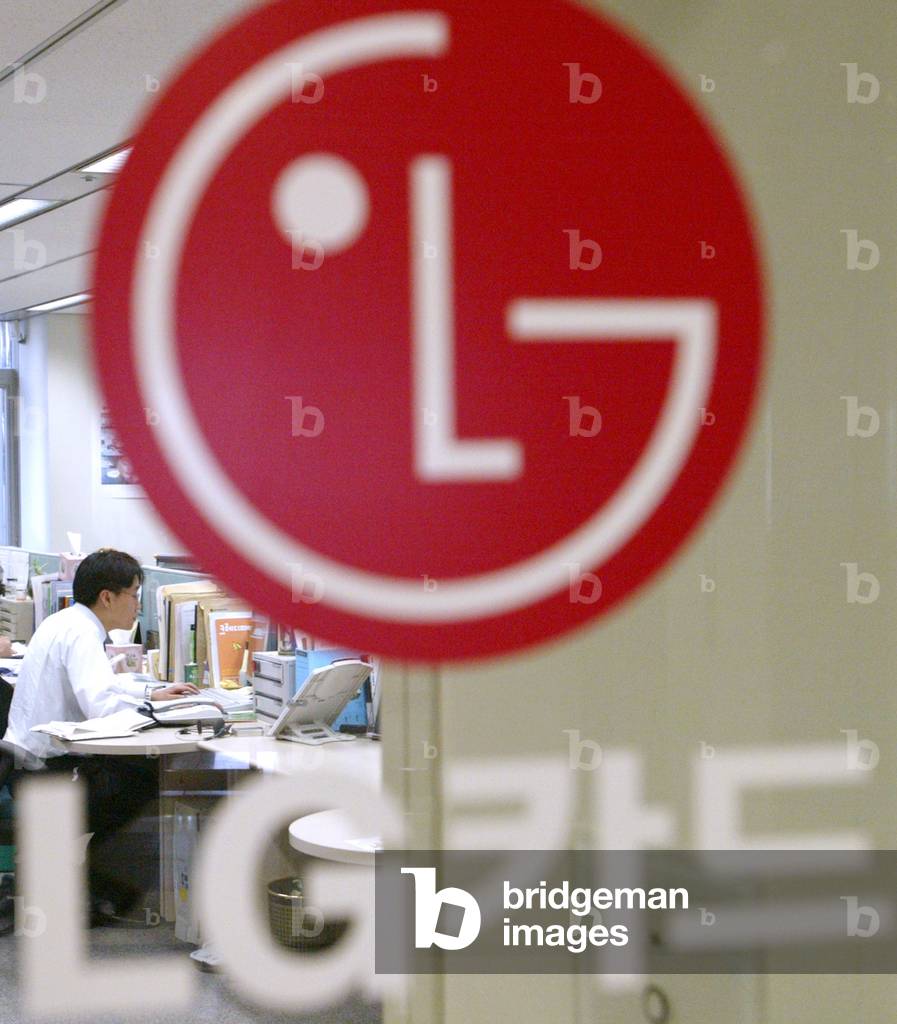 Image of EMPLOYEE OF LG CARD WORKS AT THE HEADQUARTERS IN SEOUL,
