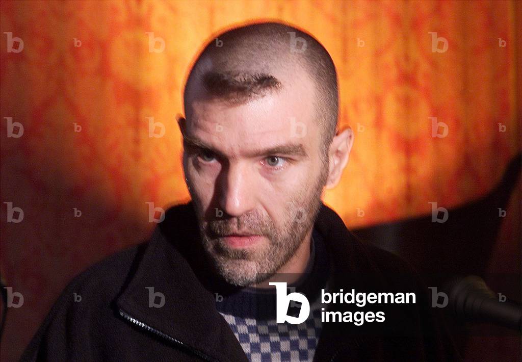 Image of Accused French serial killer Patrice Alegre appears in court at