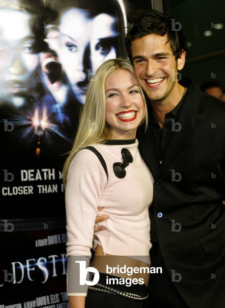 Image of Cast members Sarah Carter (L) and Jonathan Cherry arrive for