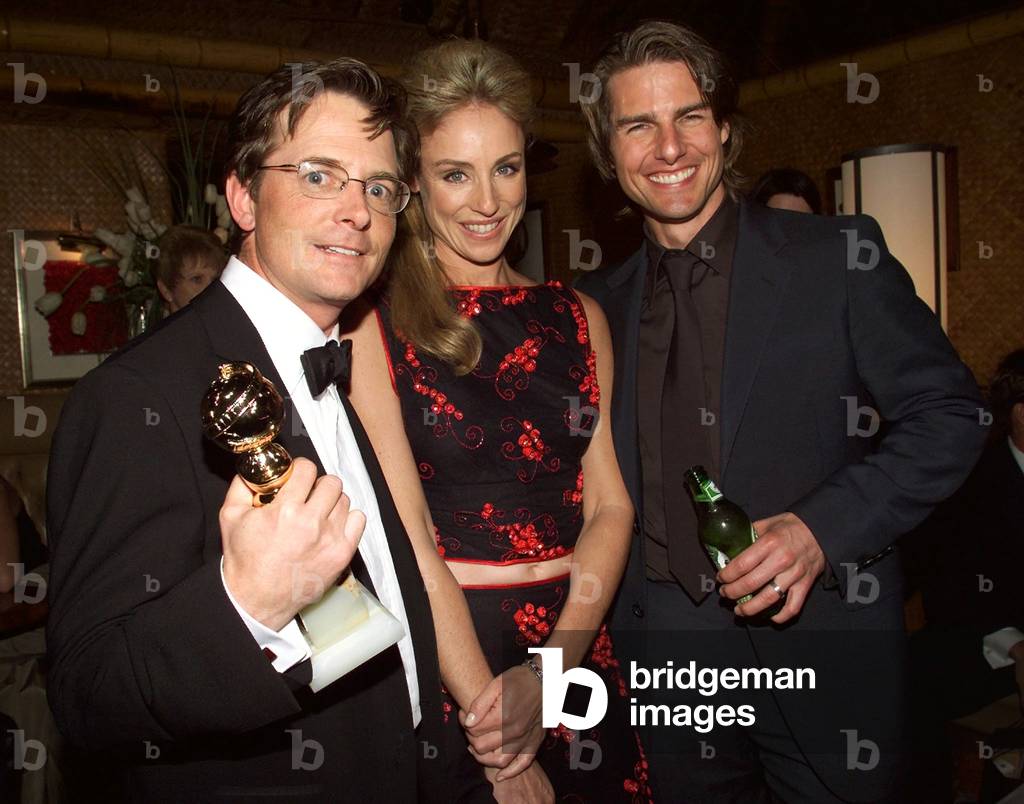 Image of Actor Michael J. Fox, wife Tracy Pollan and actor Tom