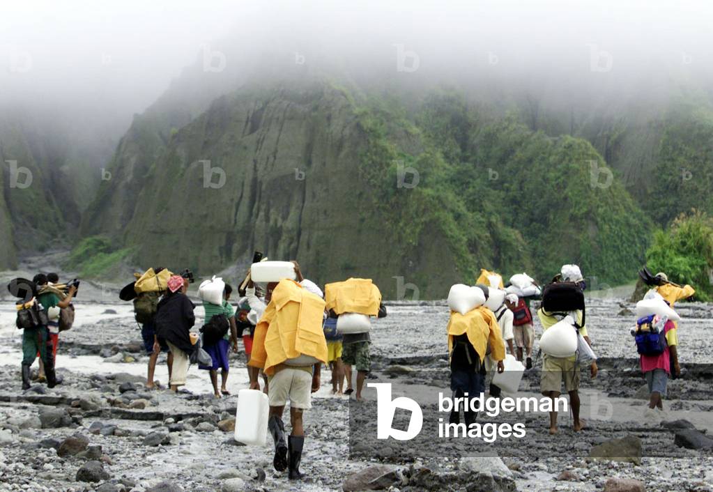 Image of FILIPINO AETAS TRIBESMEN HEAD TO THE CRATER OF MOUNT PINATUBO,