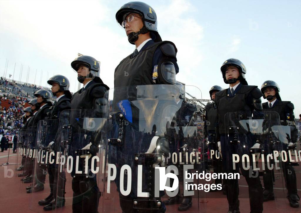 Image of Japanese anti-hooligan riot police are deployed at National ...