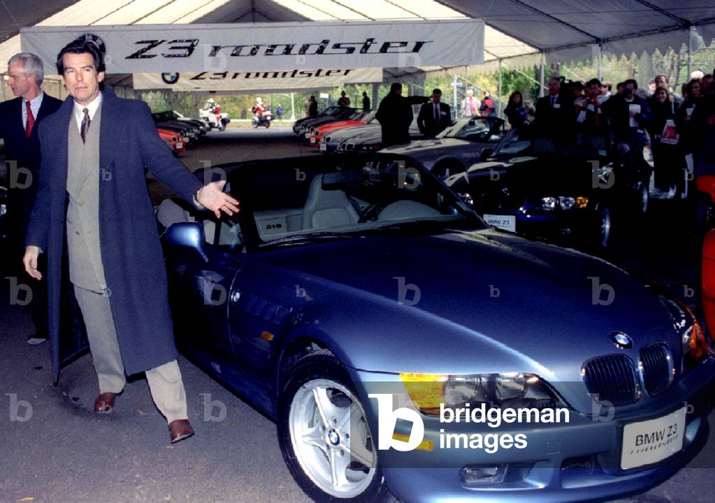 Image of Actor Pierce Brosnan displays the new BMW Z3 roadster at