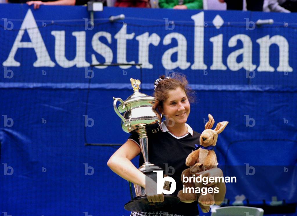 Image of World number one Monica Seles of the US holds the