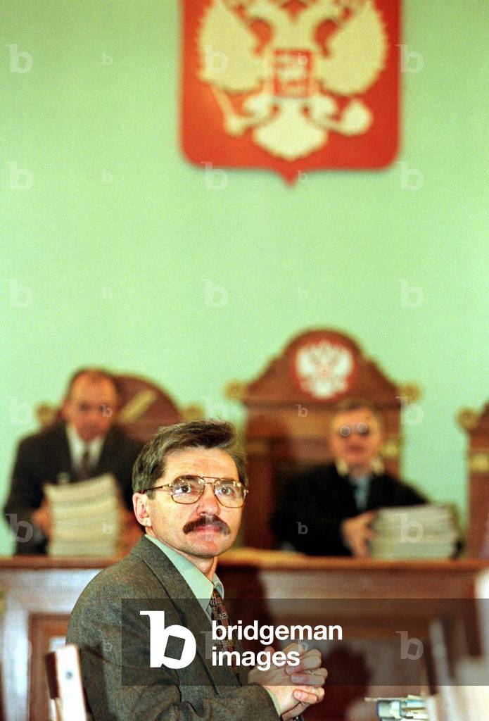 Image of FORMER RUSSIAN NAVAL OFFICER ALEXANDER NIKITIN LOOKS ON, 1998 ...