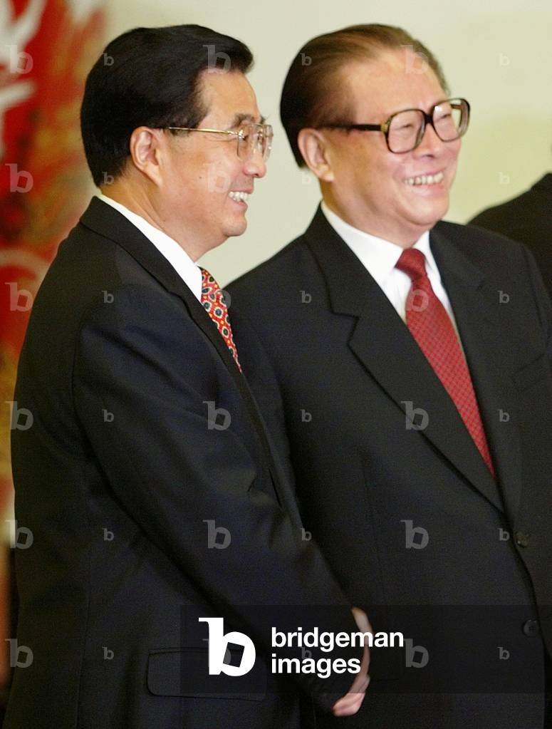 Image of CHINESE PRESIDENT JIANG ZEMIN IS GREETED BY VICE PRESIDENT HU