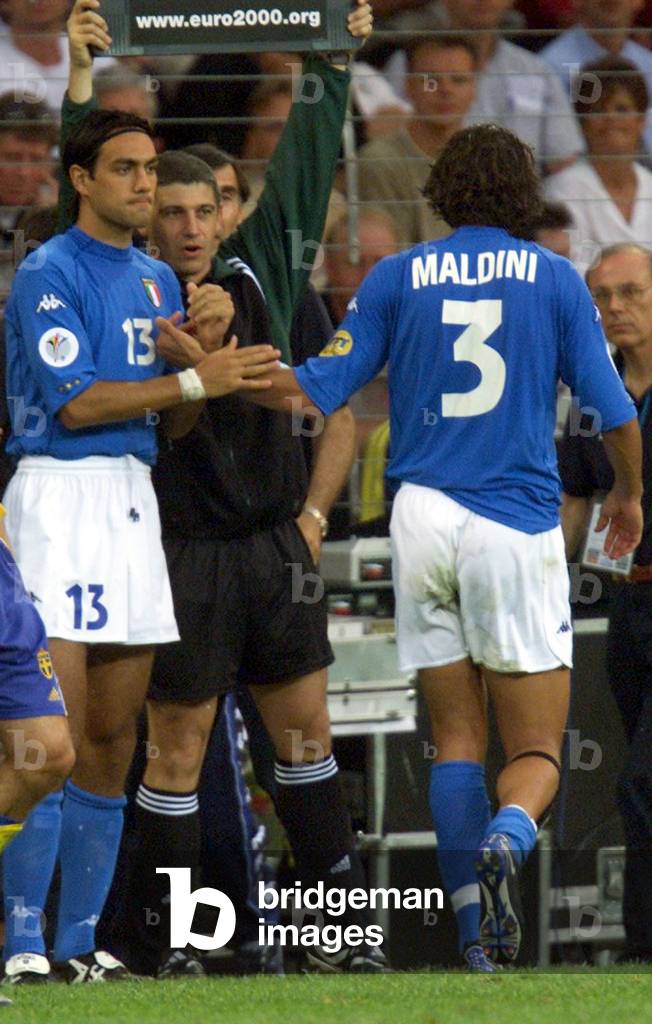 Image of ITALY'S PAOLO MALDINI IS SUBSTITUTED FOR ALESSANDRO NESTA AFTER AN